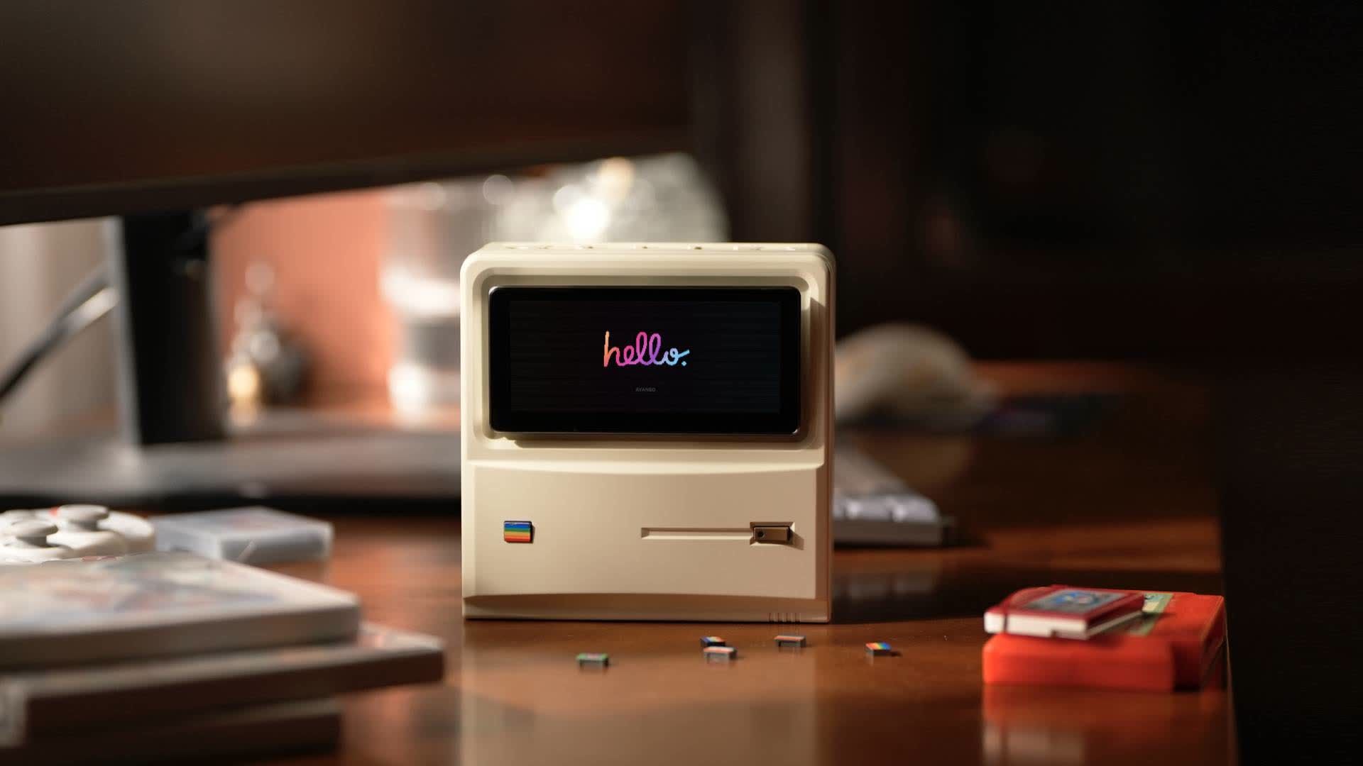 A mini Macintosh Classic-style PC featuring a flip-up display is ...